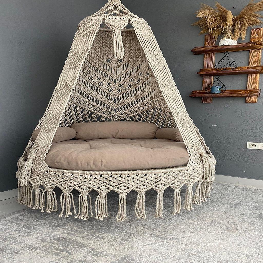 Cozy Retreat Swing Chairs Elevate Outdoor Spaces with Macrame Charm.