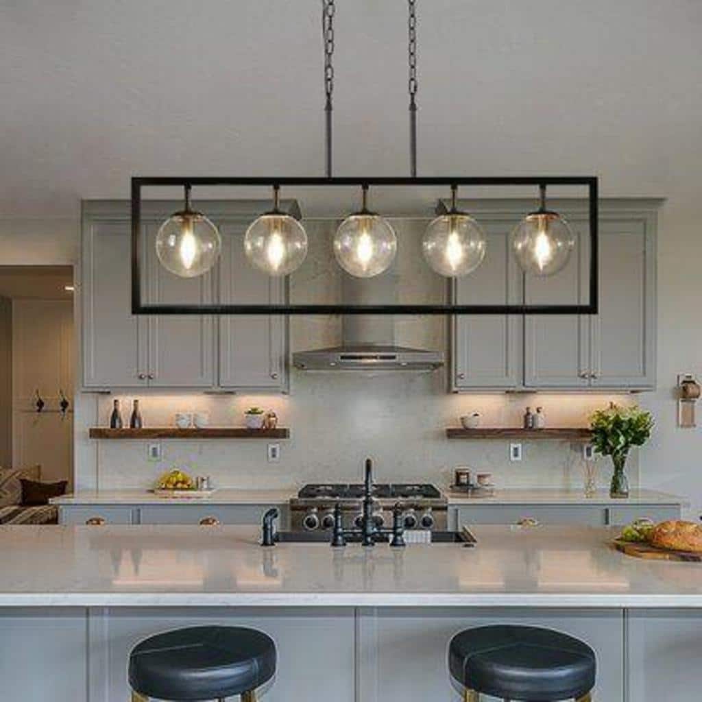 Illuminate Your Kitchen Island with Sleek Modern Lighting.
