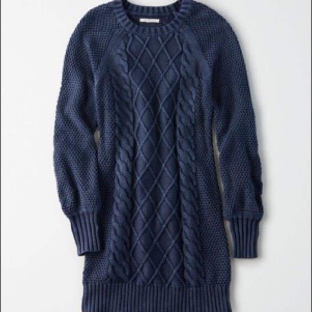 Timeless Knit Dress Elevated with Chic Cable Detailing.