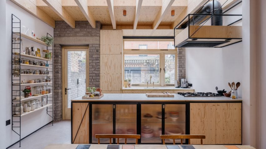 Khan Bonshek Reinvents East London Home with Central Brick Spine Wall